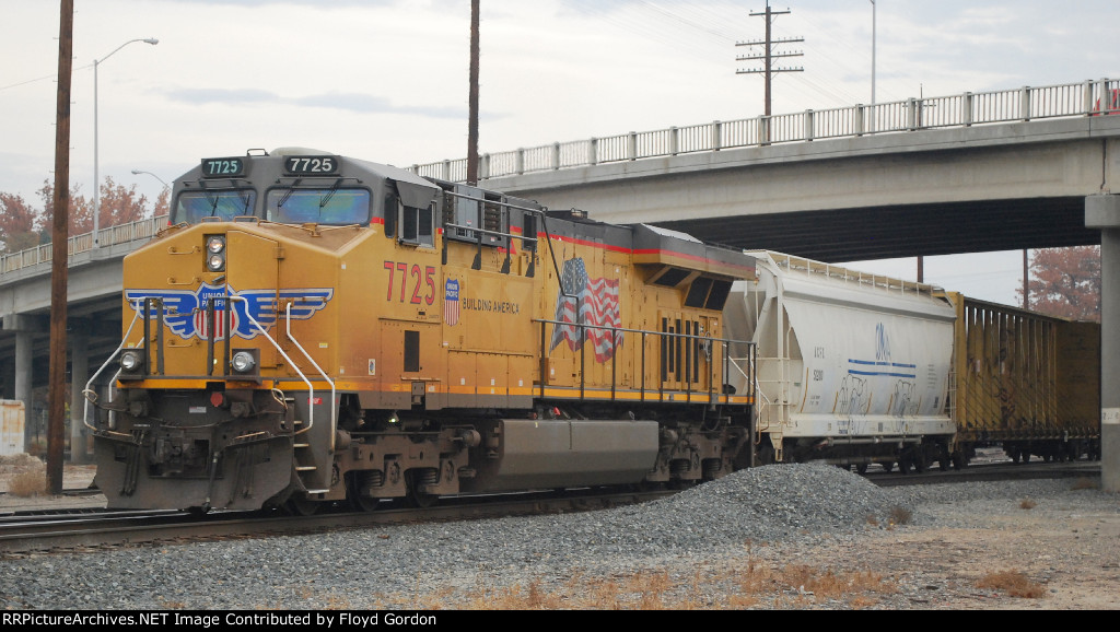 UP 7725 is DPU on west headed UP freight